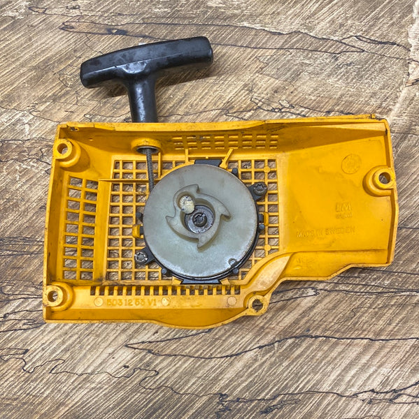 Partner 500, 5000 chainsaw starter cover and pulley assembly #2