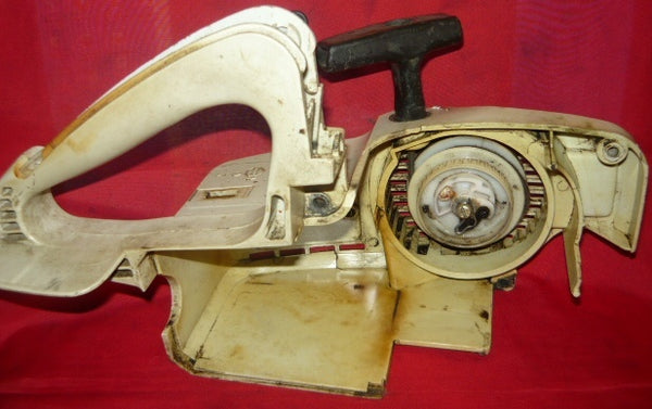 stihl 009 chainsaw starter recoil cover and pulley assembly