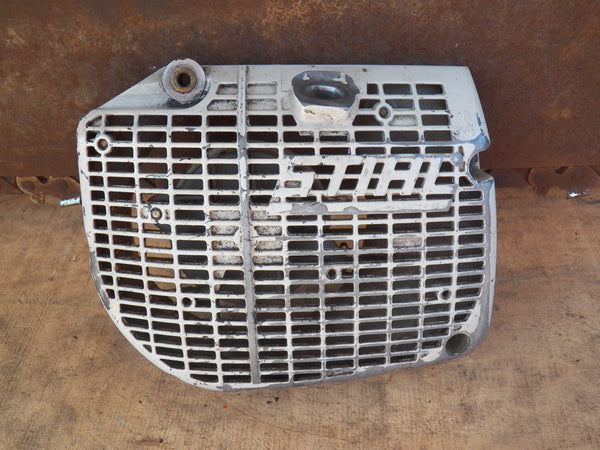 Stihl MS660 chainsaw starter recoil cover and pulley assembly