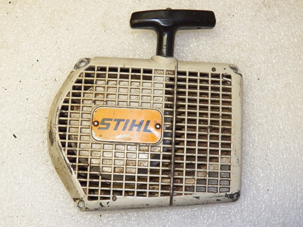 Stihl 042 chainsaw starter recoil cover and pulley assembly (friction